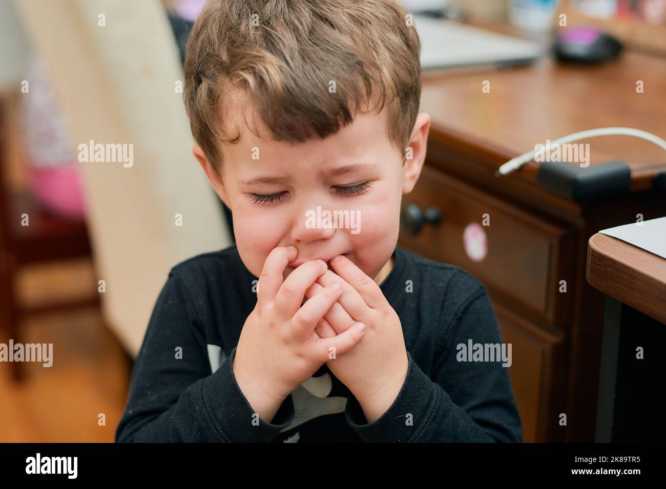 Young boy is upset and crying for some reason Stock Photo - Alamy
