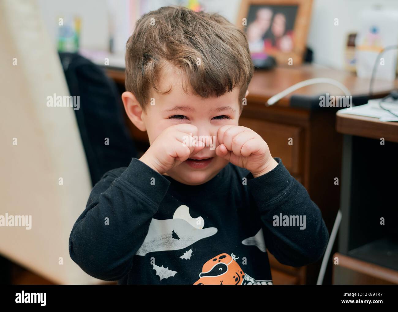 Young boy is upset and crying for some reason Stock Photo - Alamy