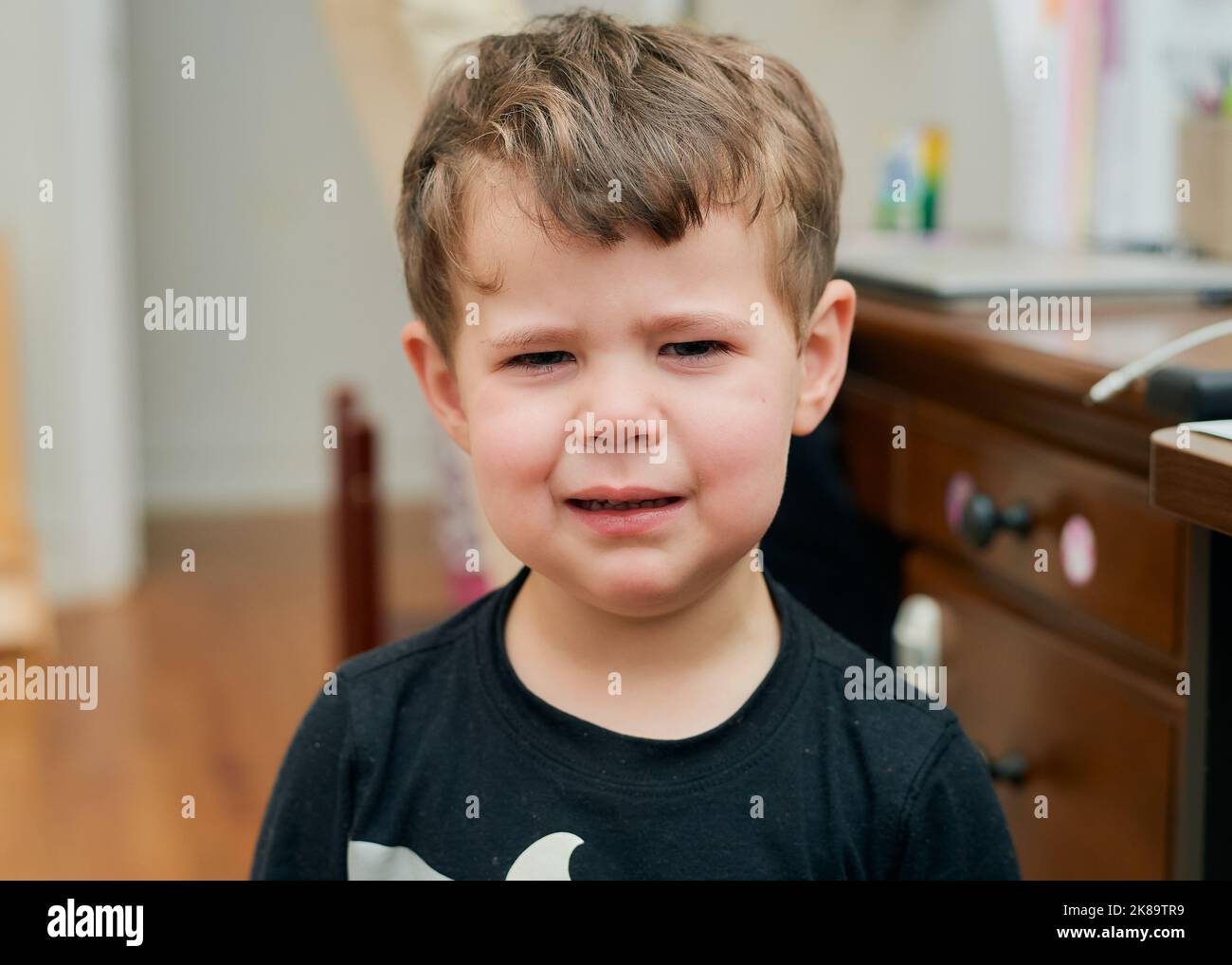 Young boy is upset and crying for some reason Stock Photo - Alamy