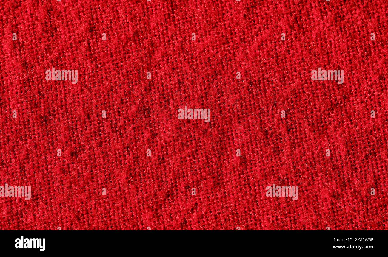 Red and fluffy knitted background textured surface for design work ...
