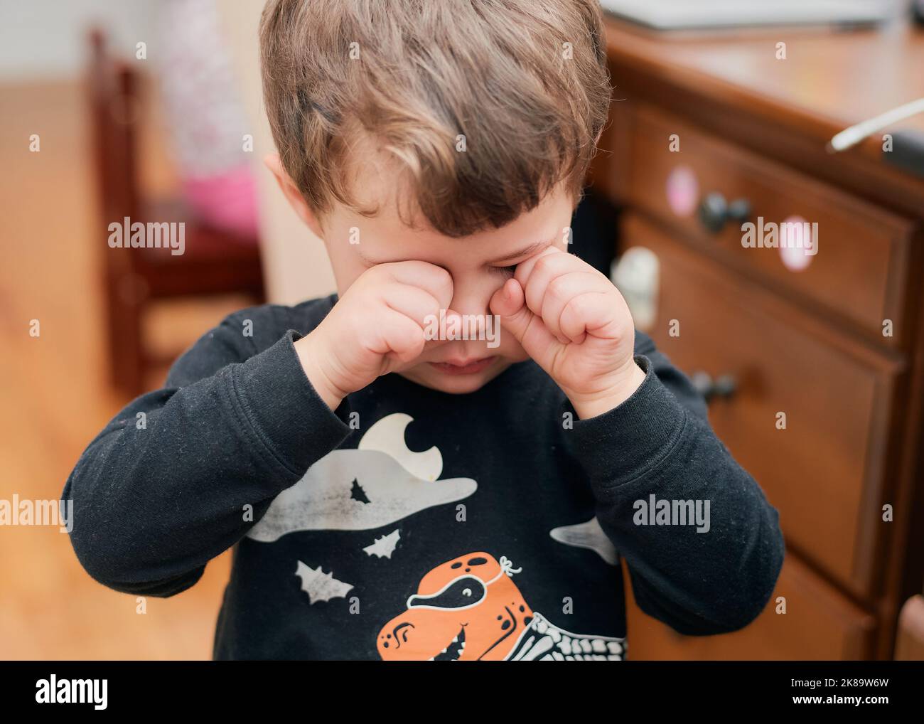 Young boy is upset and crying for some reason Stock Photo - Alamy