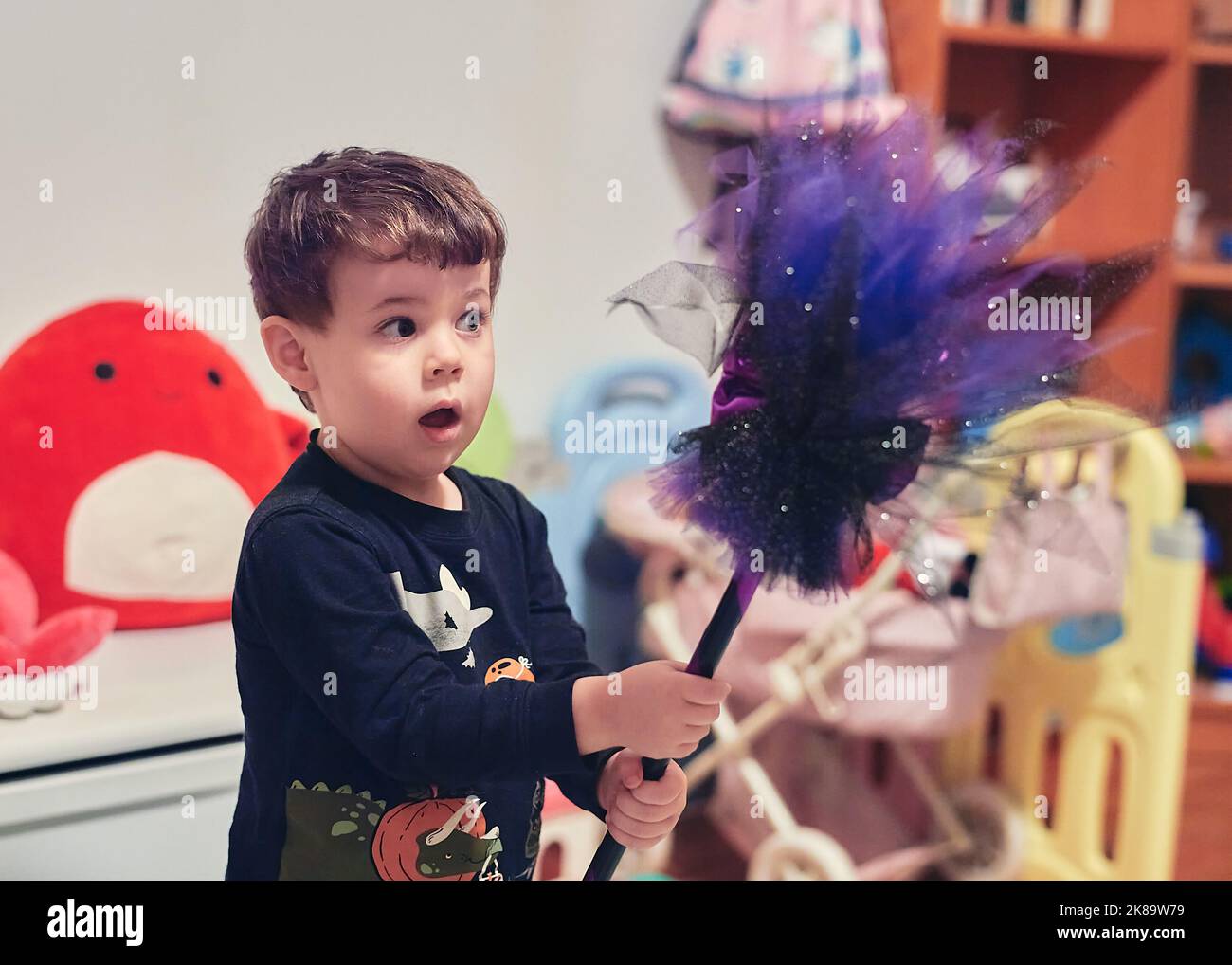 Child playing broom hi-res stock photography and images - Alamy
