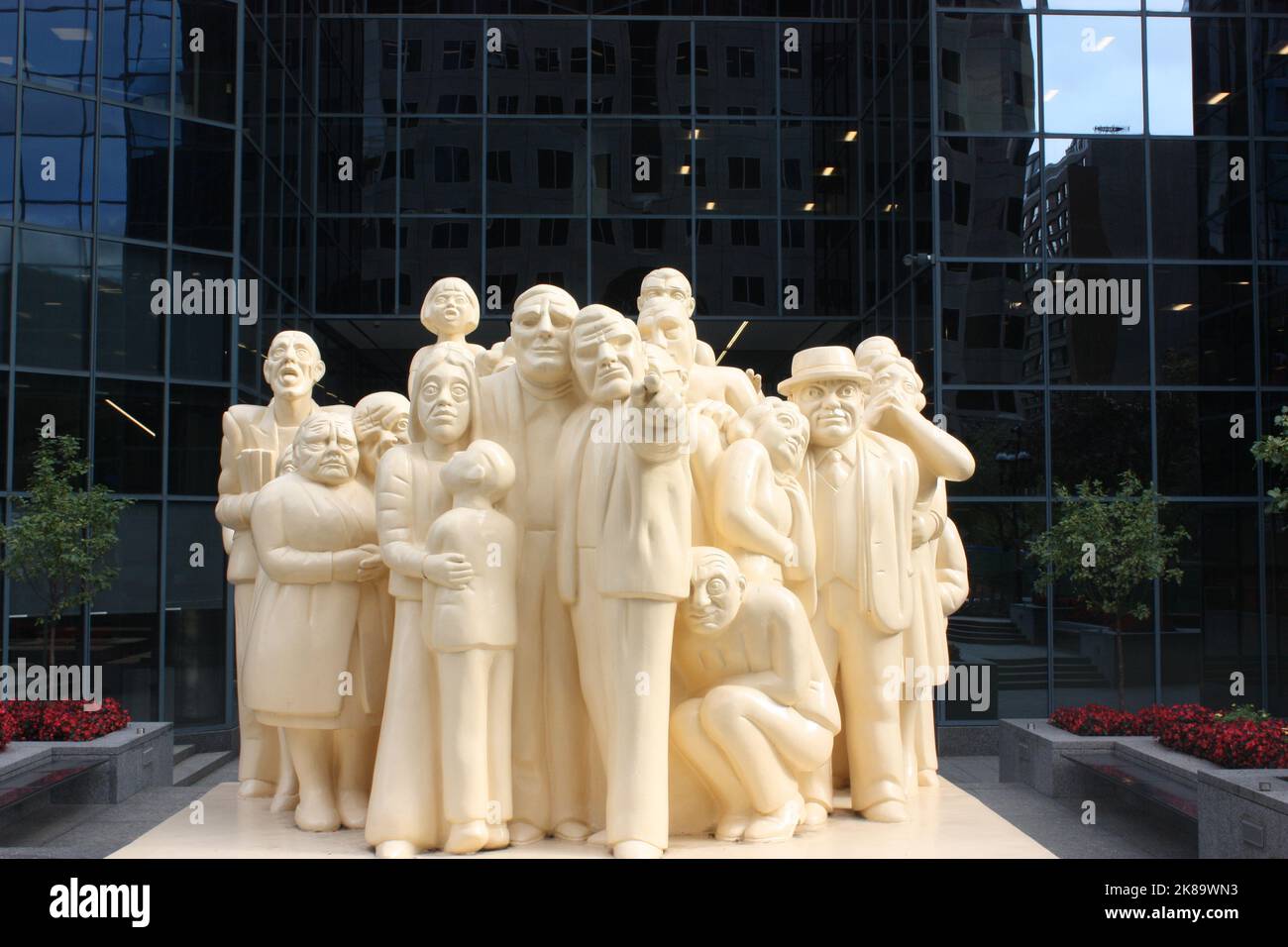 The sculpture Illuminated Crowd outside the Fiera Capital building in ...