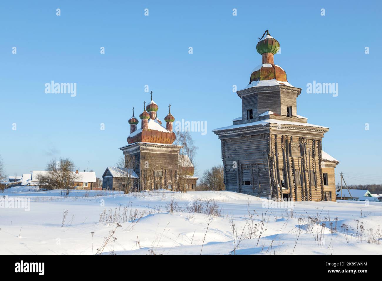 Ancient wooden temple complex in winter rural landscape. Shelokhovskaya ...