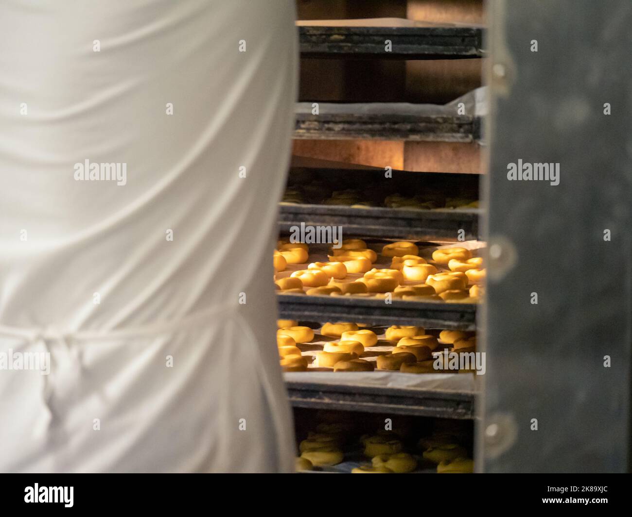 preparing sweet yellow cookies in the bakery Stock Photo - Alamy