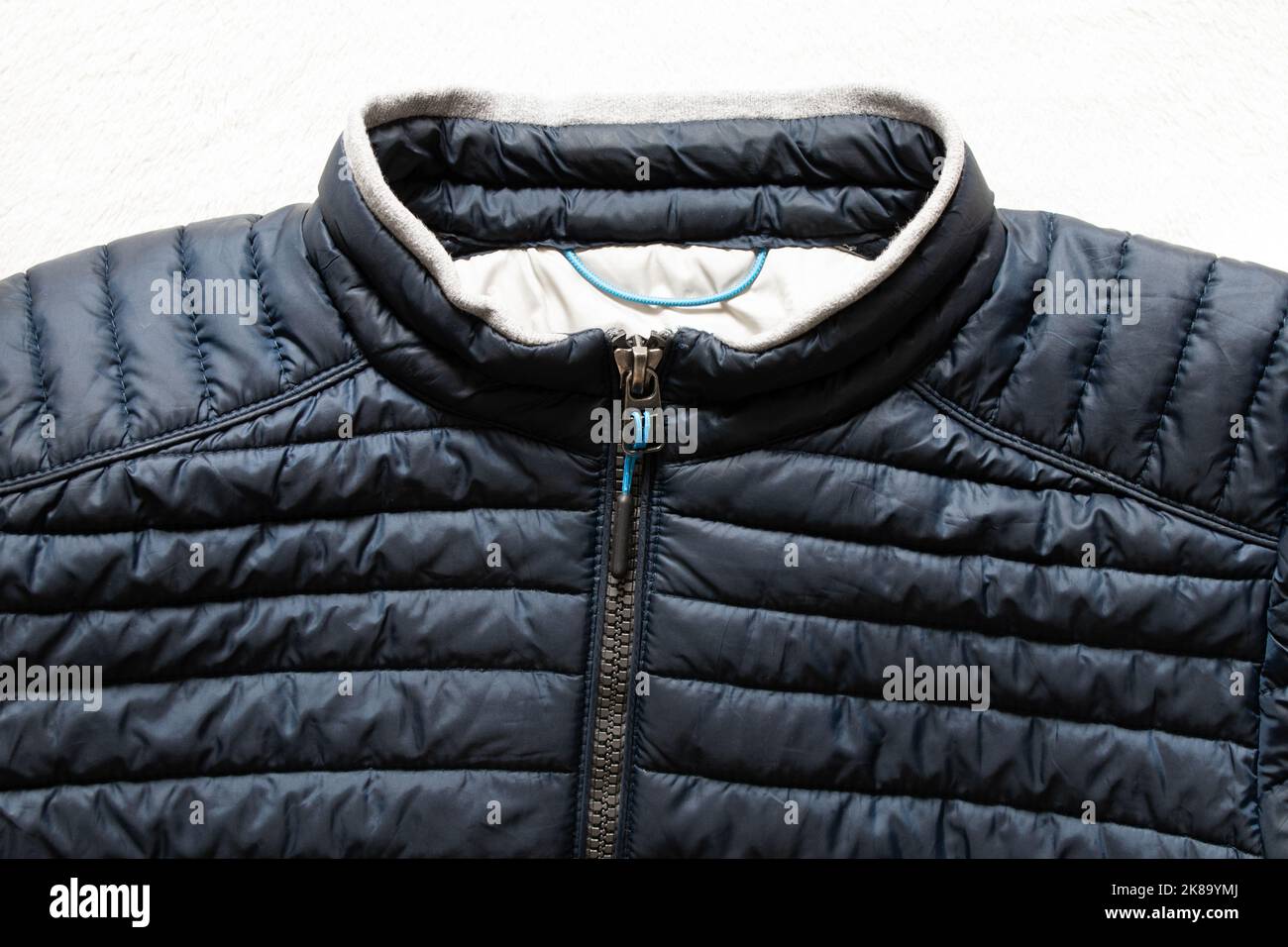 Blue zipper jacket hi-res stock photography and images - Alamy