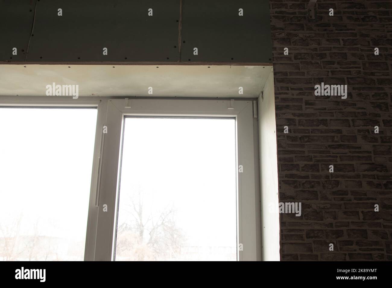 windows with plasterboard slopes, moisture and fungus, apartment ...