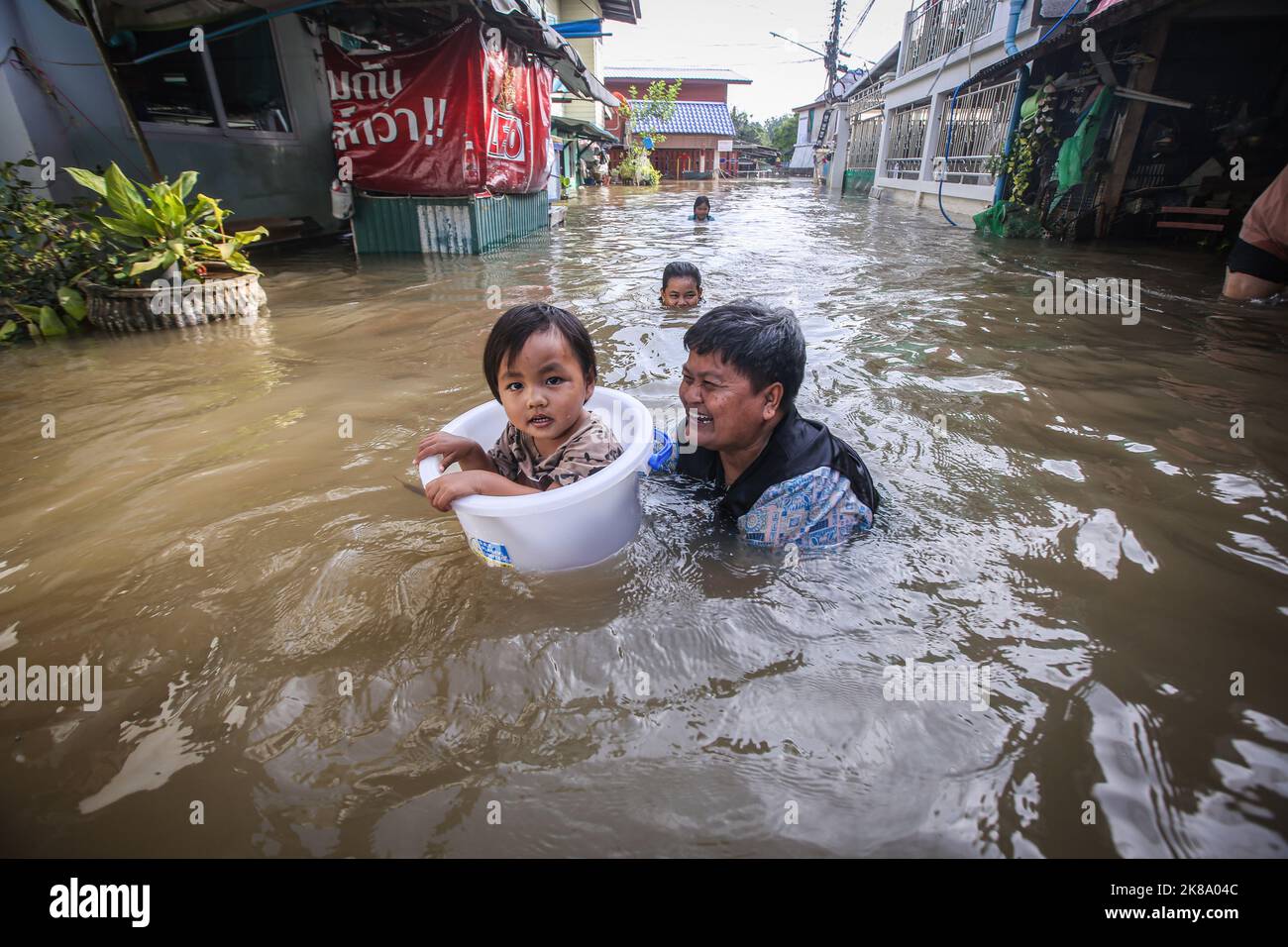 Children playing in flood water hi-res stock photography and images - Alamy