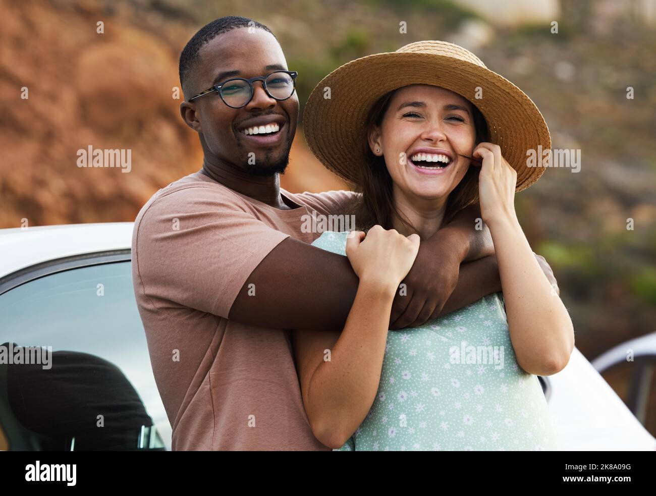 Lots of miles, lots of smiles. Portrait of a happy young couple ...