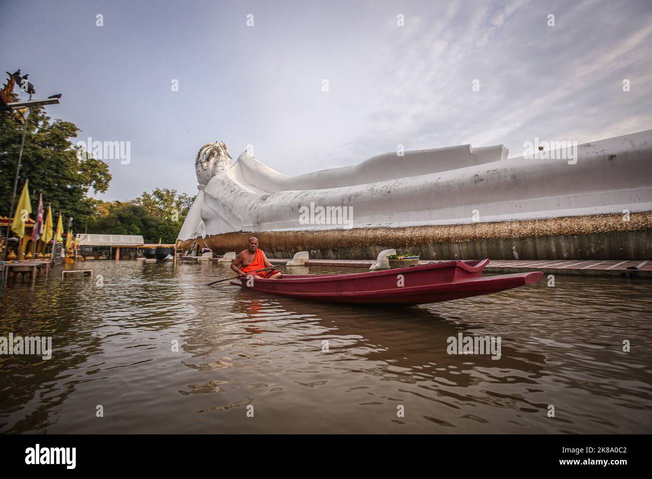 Ayutthaya, Thailand. 14th Oct, 2022. Monks have to paddle around the ...