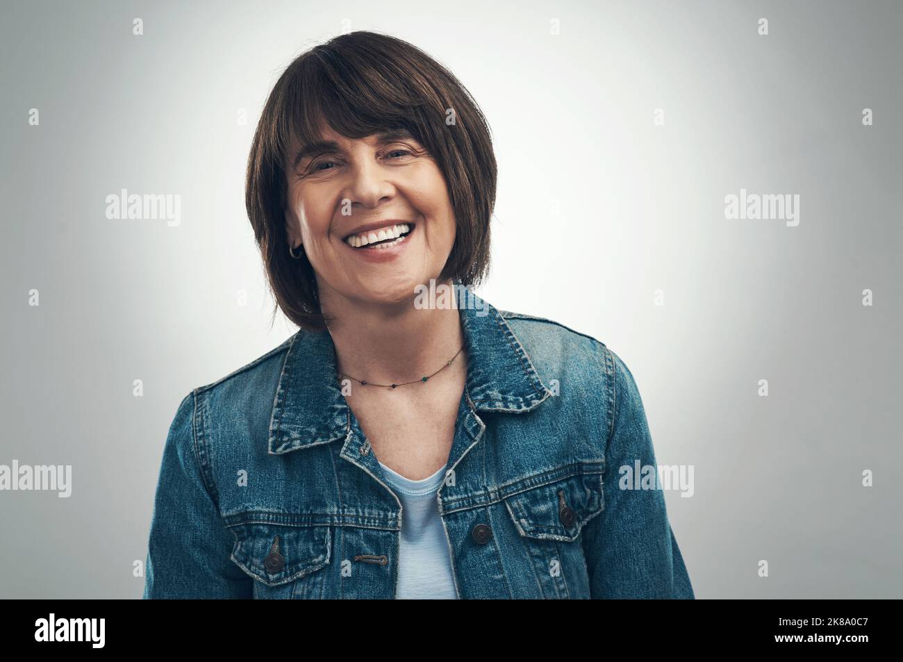 Feeling a little sunshine in her soul. Studio portrait of a senior ...