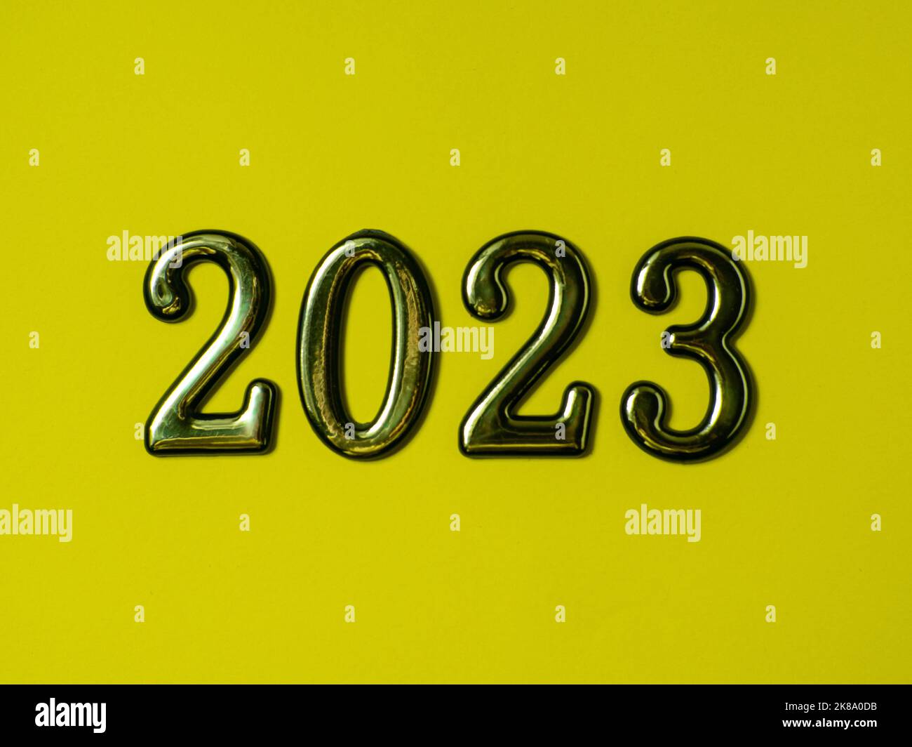 2023 on yellow background Stock Photo - Alamy
