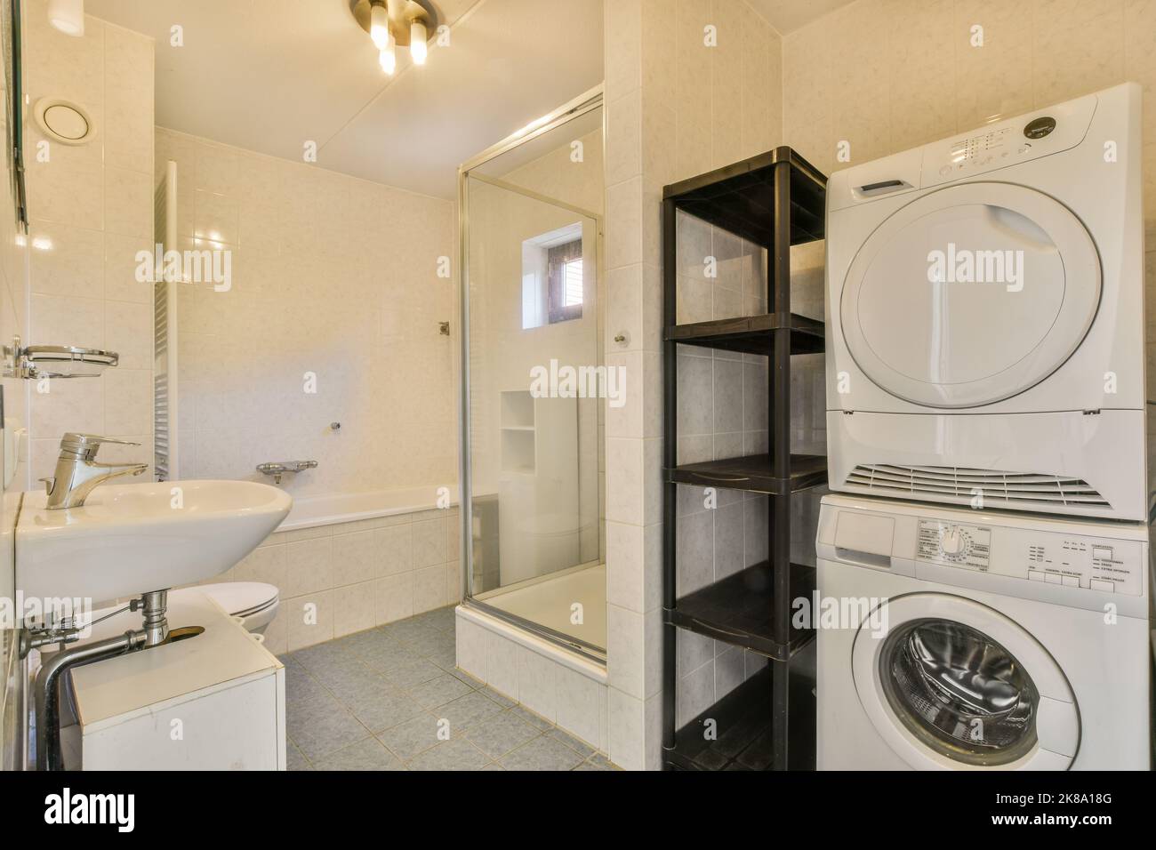 Modern home interior design of white bathroom with open bathtub and ...