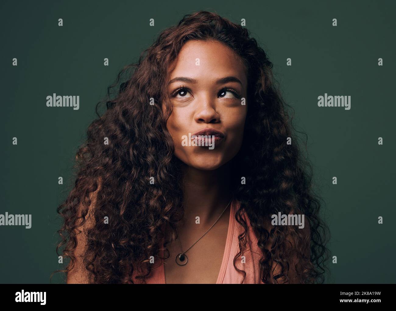 Shes a little crazy. an attractive and quirky young woman posing ...