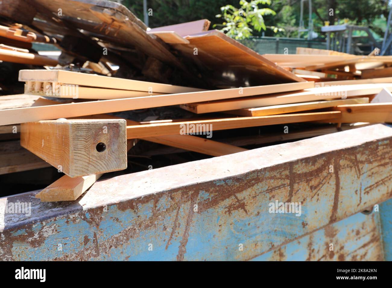 containers with pieces of broken wood to be recycled in the recycling ...