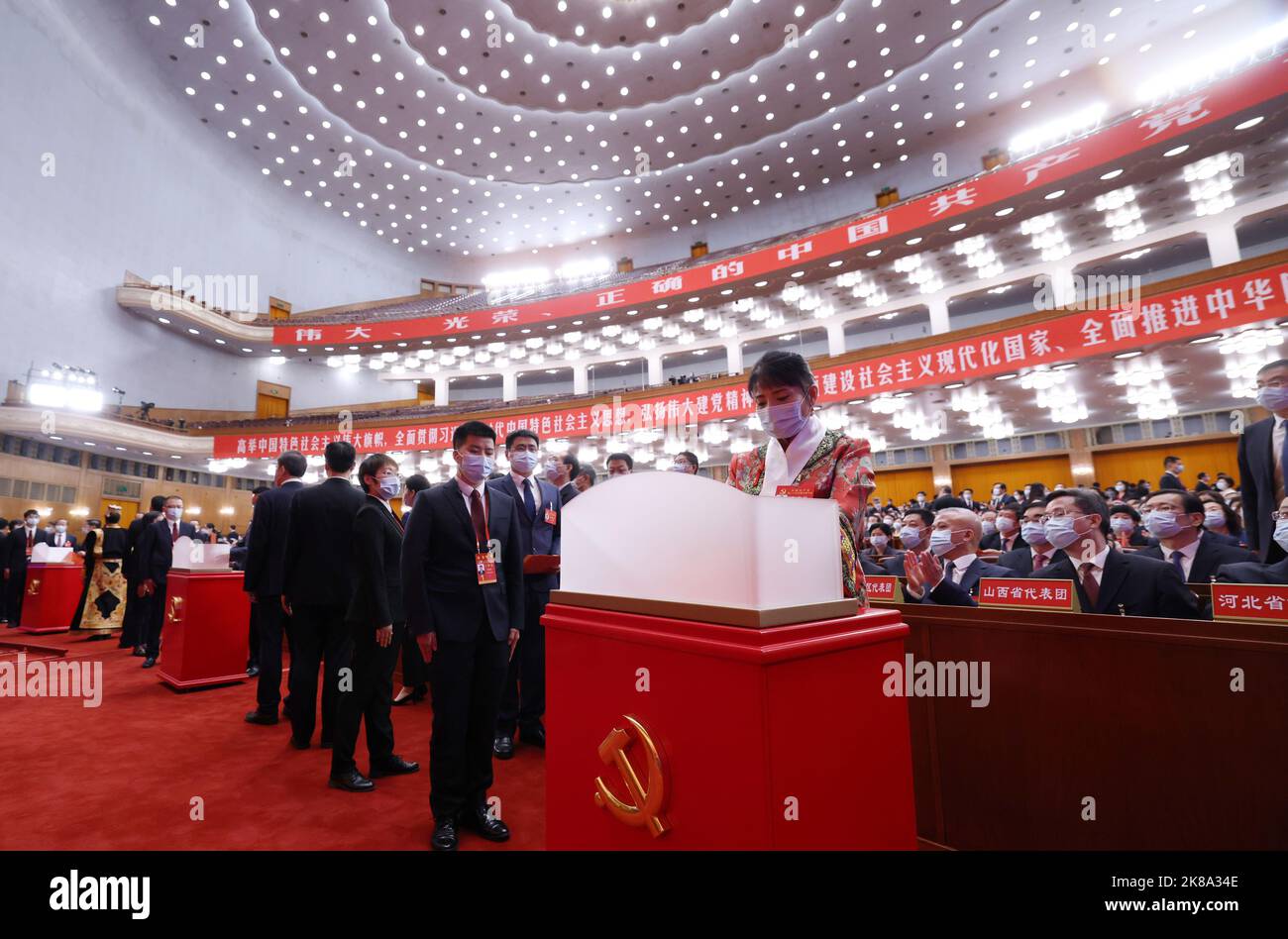 Beijing, China. 22nd Oct, 2022. A delegate casts her ballot at the ...
