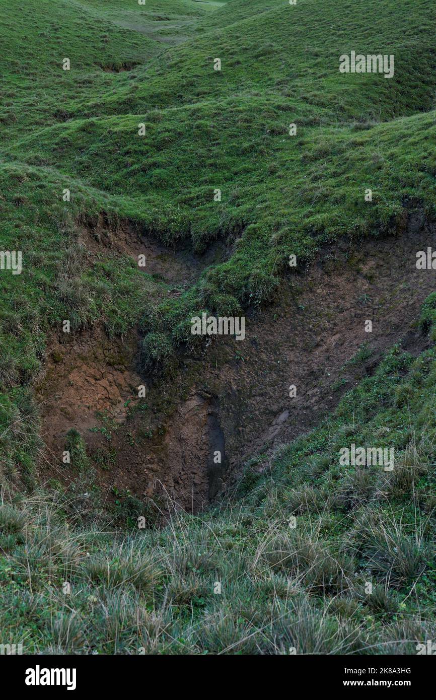 Landscape with sinkholes and suckers of a karst system in the mountains ...