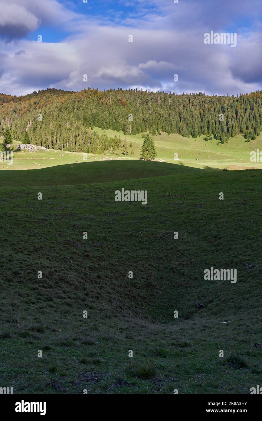 Landscape with sinkholes and suckers of a karst system in the mountains ...
