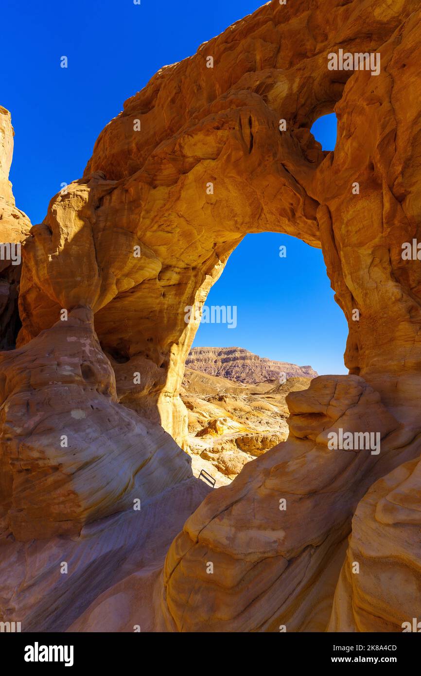 View of the big natural rock arch, in Timna desert park, southern ...
