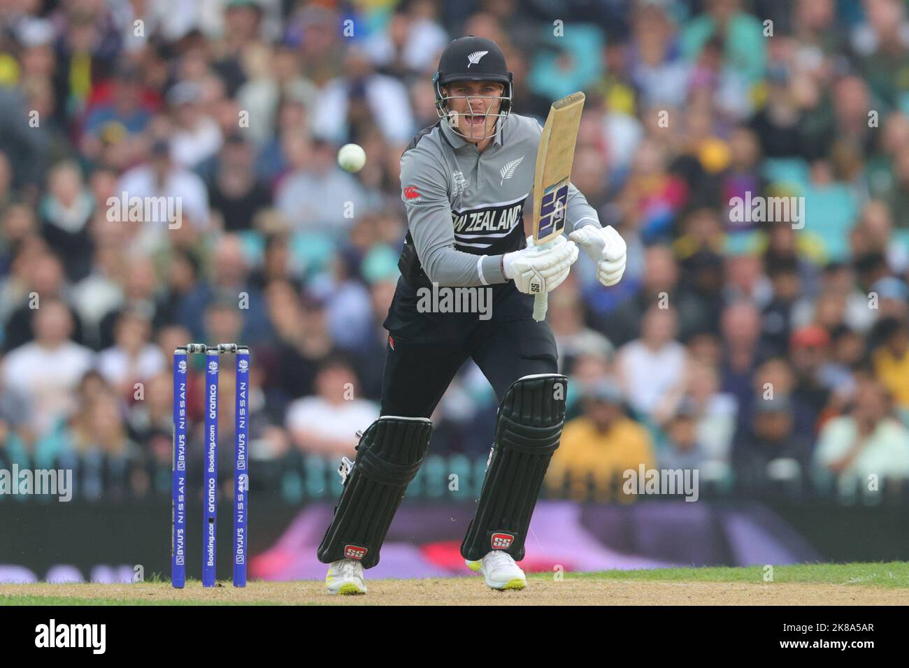 Sydney, Australia. 22nd Oct, 2022. Finn Allen of New Zealand blocks ...