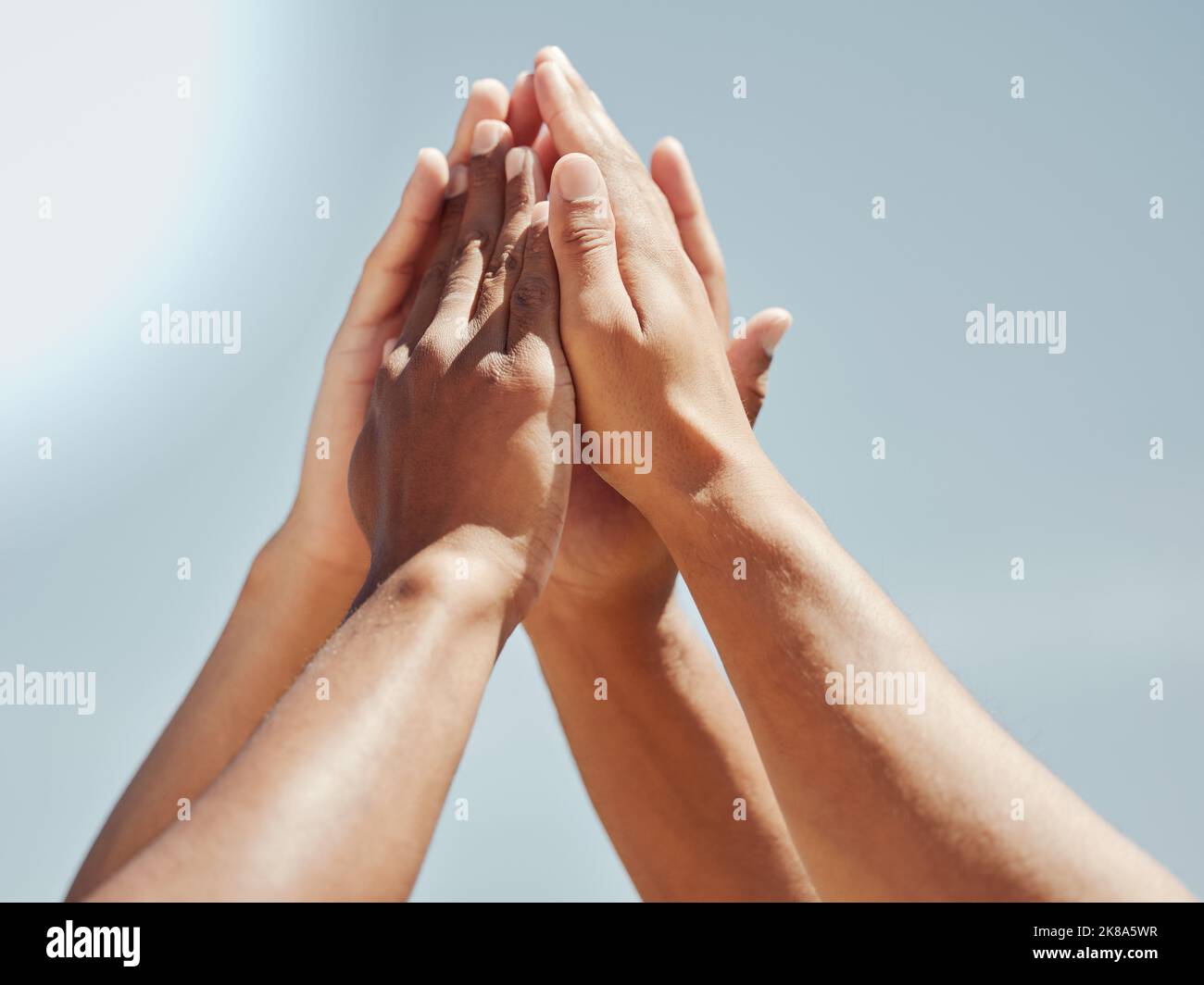 Hands, high five or teamwork collaboration success in fitness, workout ...