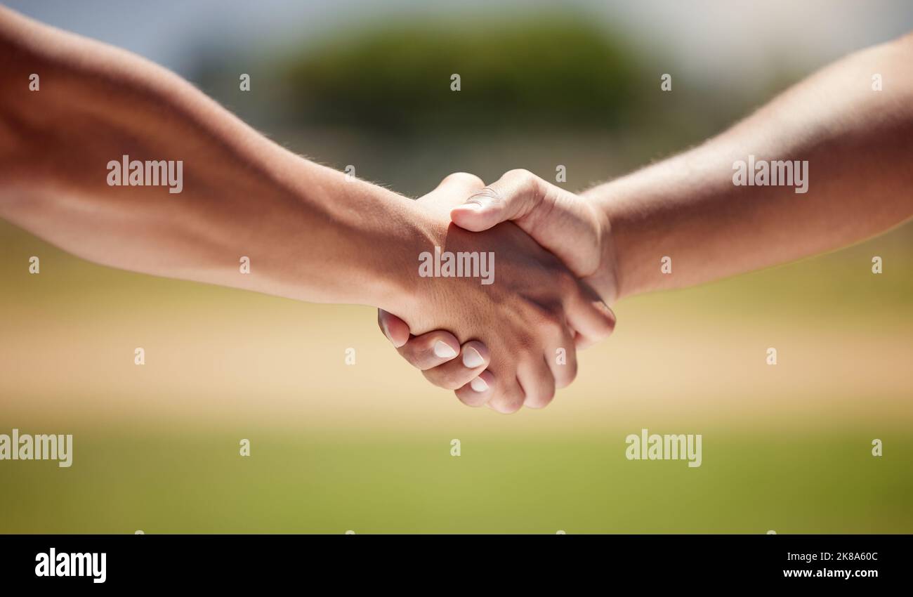Teamwork, sports and health with handshake with people playing game for ...