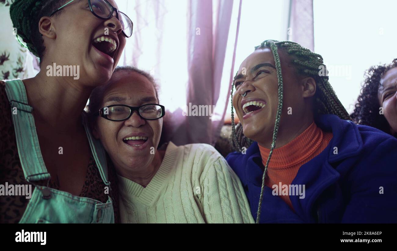 Happy hispanic people embracing. South American friends and family ...