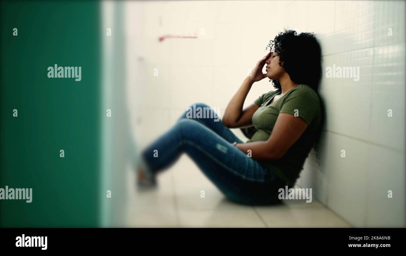 One desperate young black woman suffering from mental problems on ...