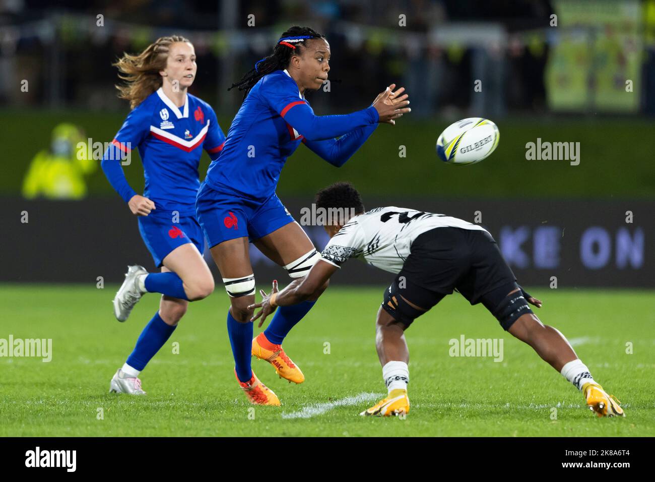 France's Julie Annery offloads during the Women's Rugby World Cup pool ...