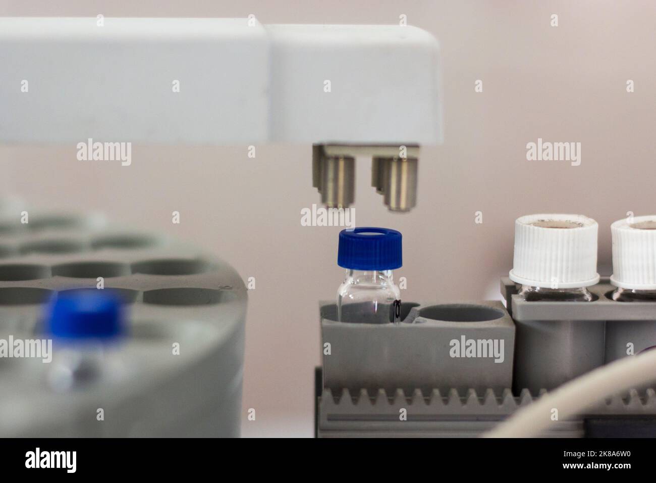 Chemical, transparent substance in a flask for analysis Stock Photo - Alamy