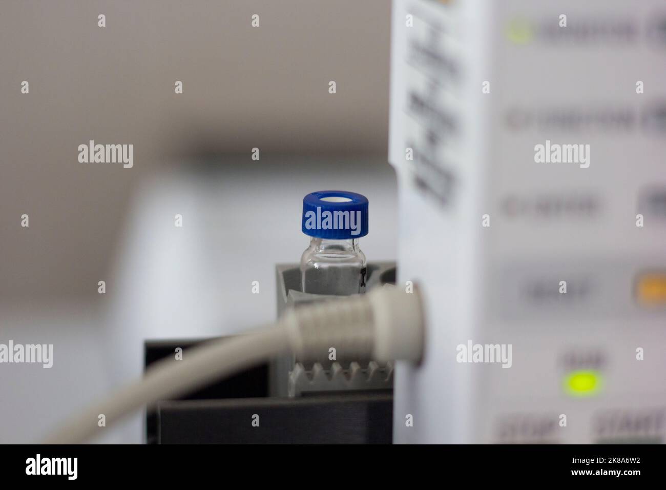 Chemical, transparent substance in a flask for analysis Stock Photo - Alamy