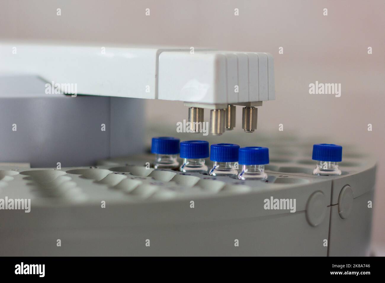 Chemical, transparent substance in a flask for analysis Stock Photo - Alamy