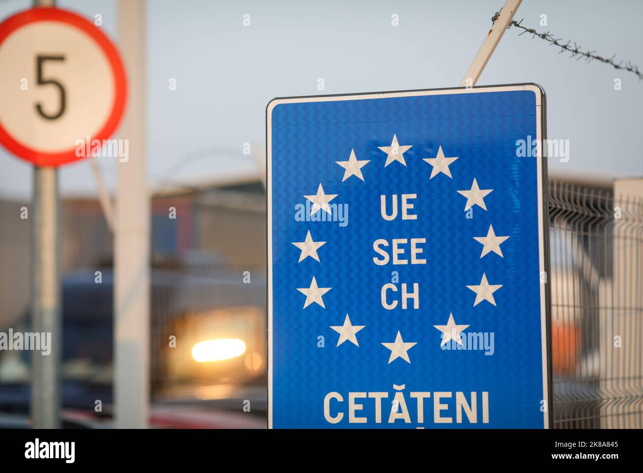 Details with an European Union flag and barbed wire at a Romanian ...