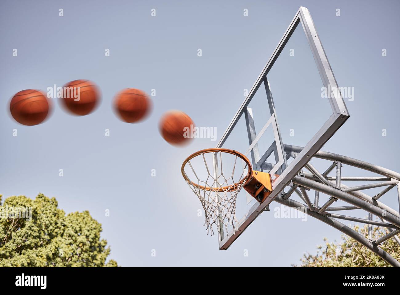 Basketball, point and ball in basket for winning score on basketball ...