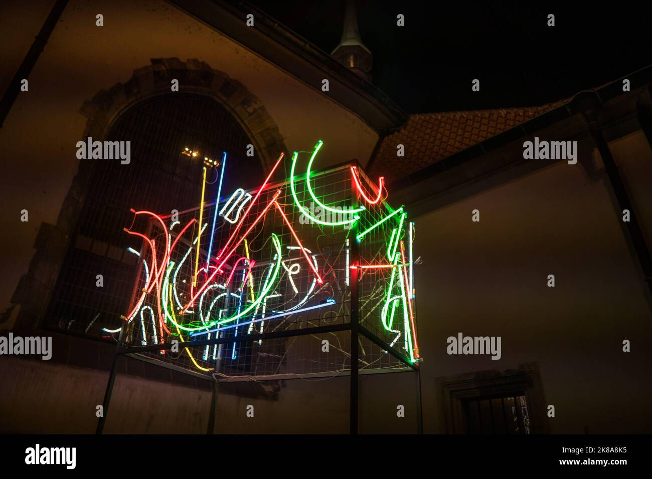 Neon light installation iside building in Prague Stock Photo - Alamy