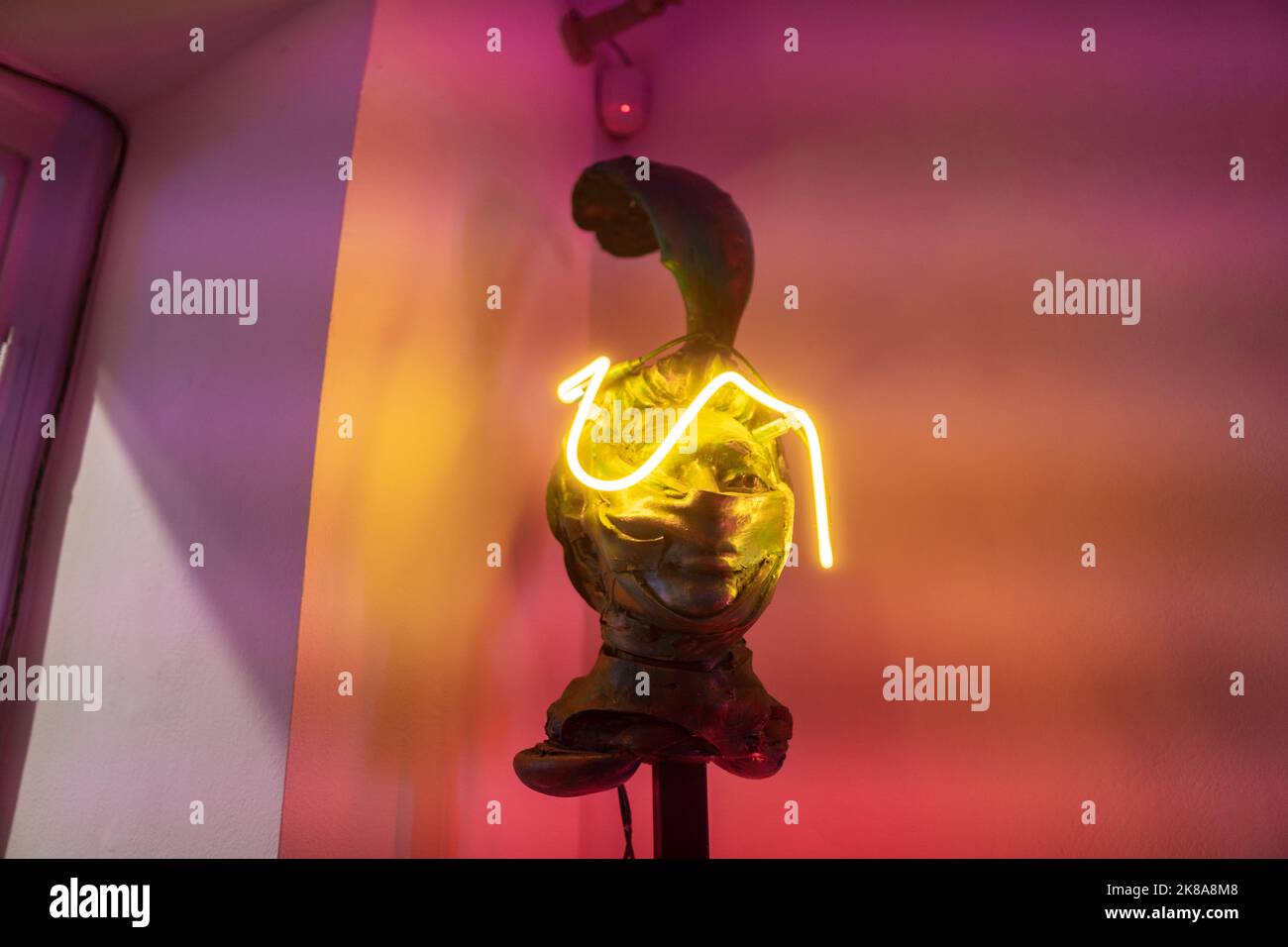 Neon light installation iside building in Prague Stock Photo - Alamy