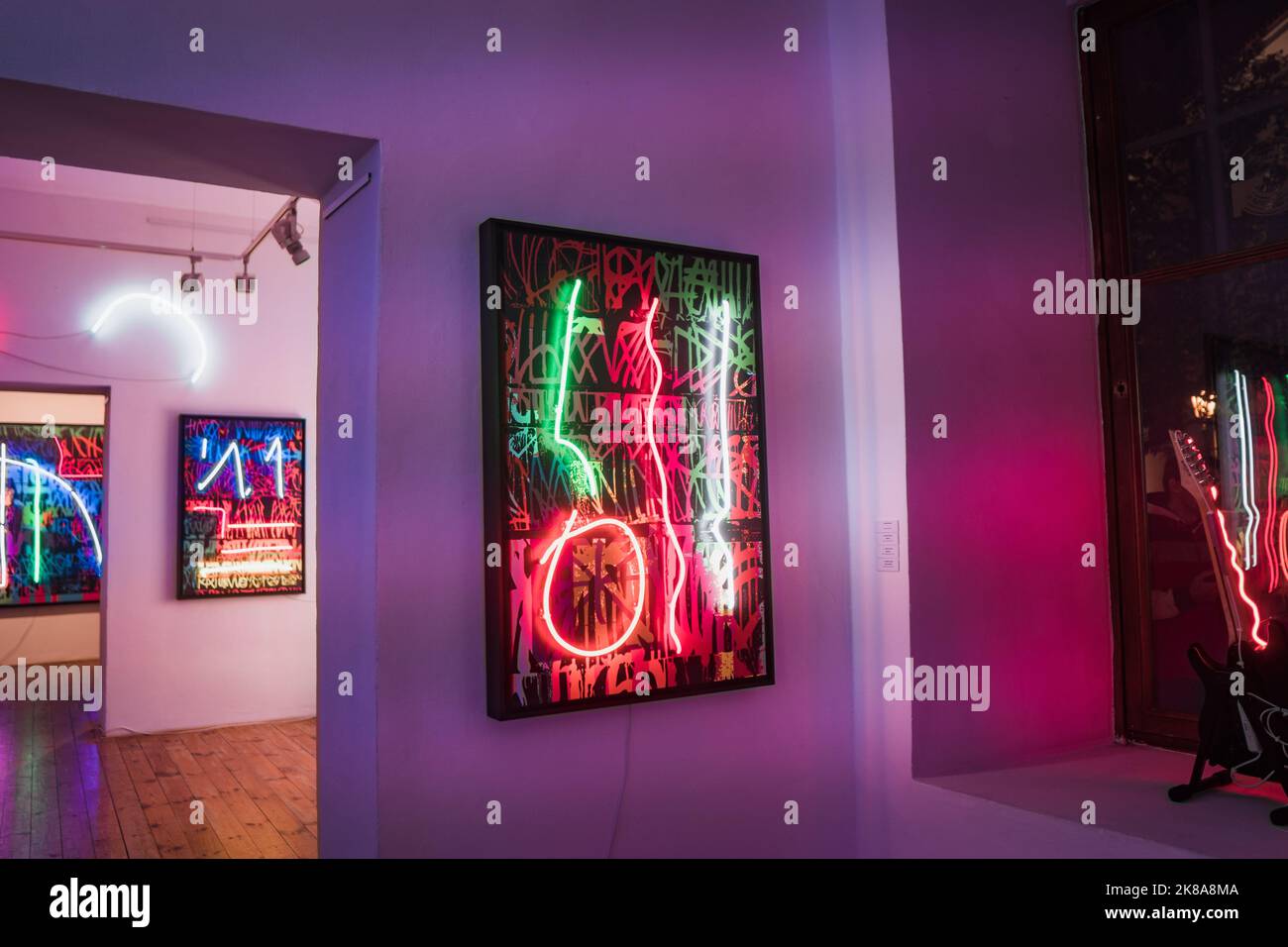 Neon light installation iside building in Prague Stock Photo - Alamy