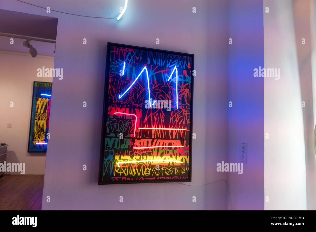 Neon light installation iside building in Prague Stock Photo - Alamy