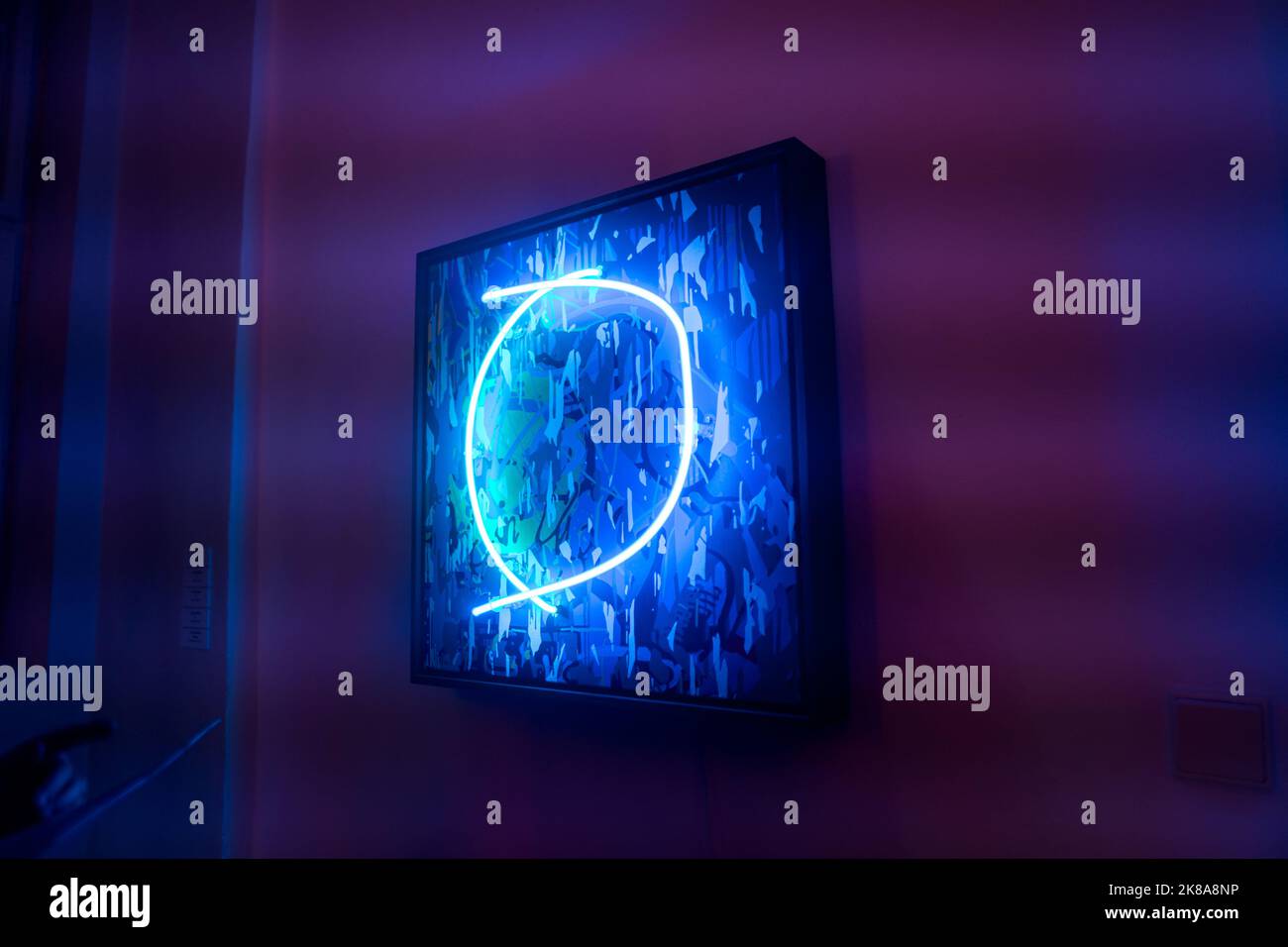 Neon light installation iside building in Prague Stock Photo - Alamy