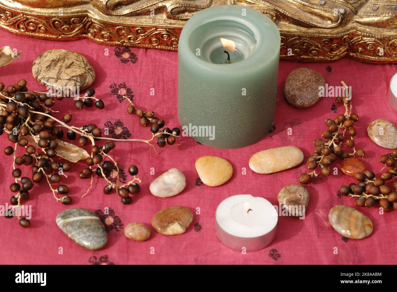 candle and gems for spiritual rituals Stock Photo - Alamy