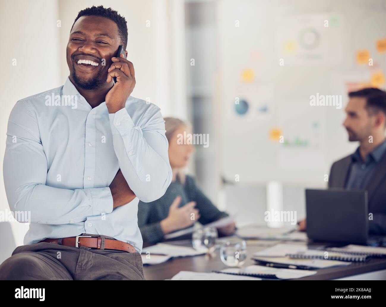 Black man, meeting and smartphone for call, planning and doing strategy ...