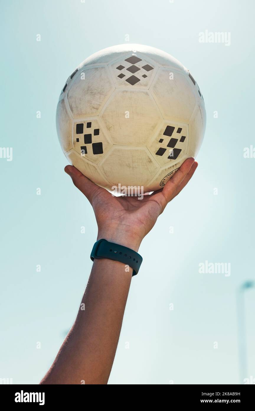 Hand, soccer ball and sport motivation for football, fitness and ...