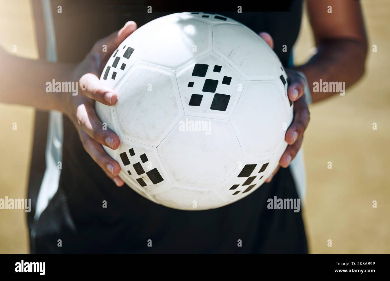 Carrying soccer ball hi-res stock photography and images - Alamy