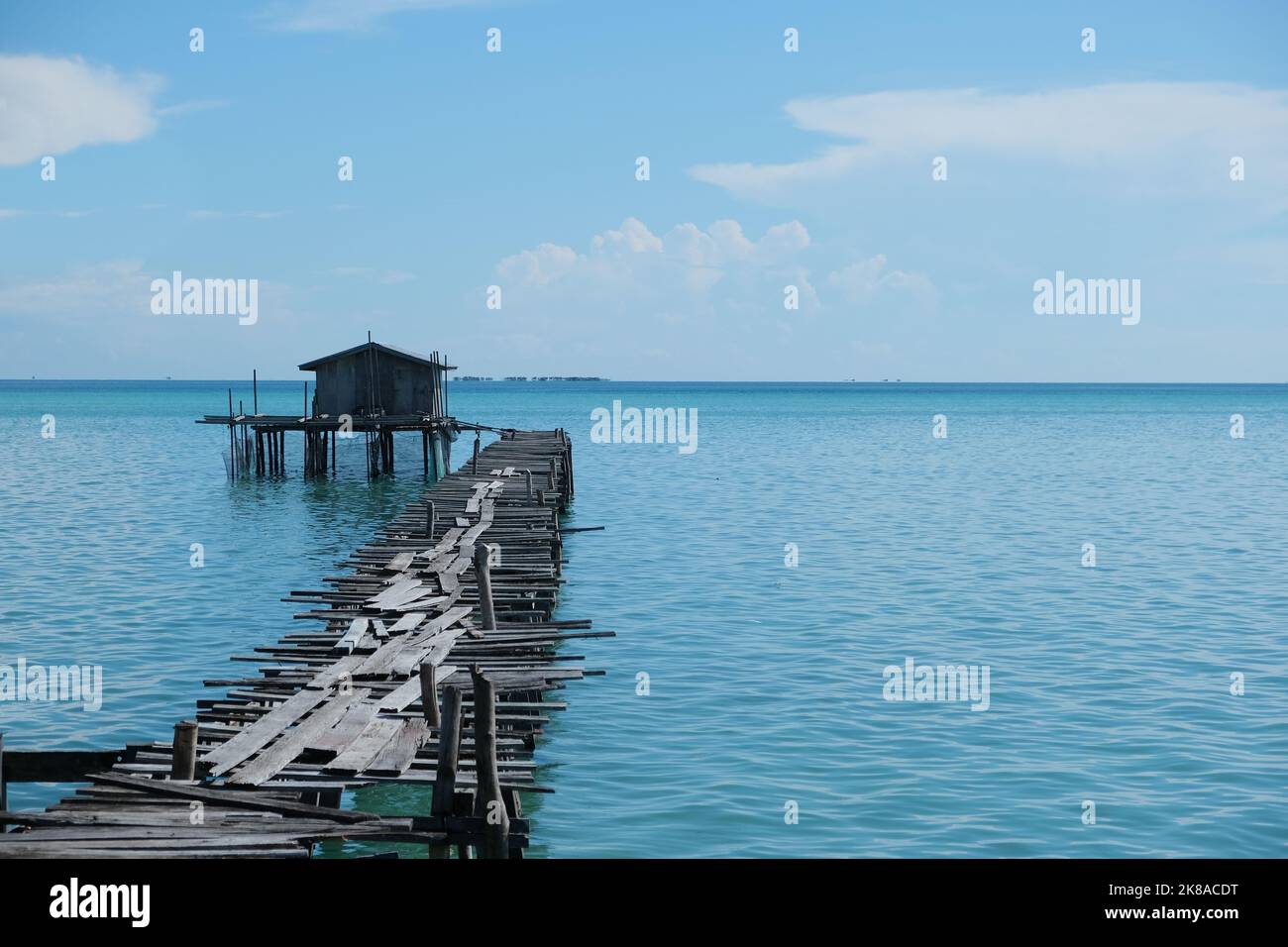 A rustic bridge connecting the jetty at pulau bum bum Stock Photo - Alamy