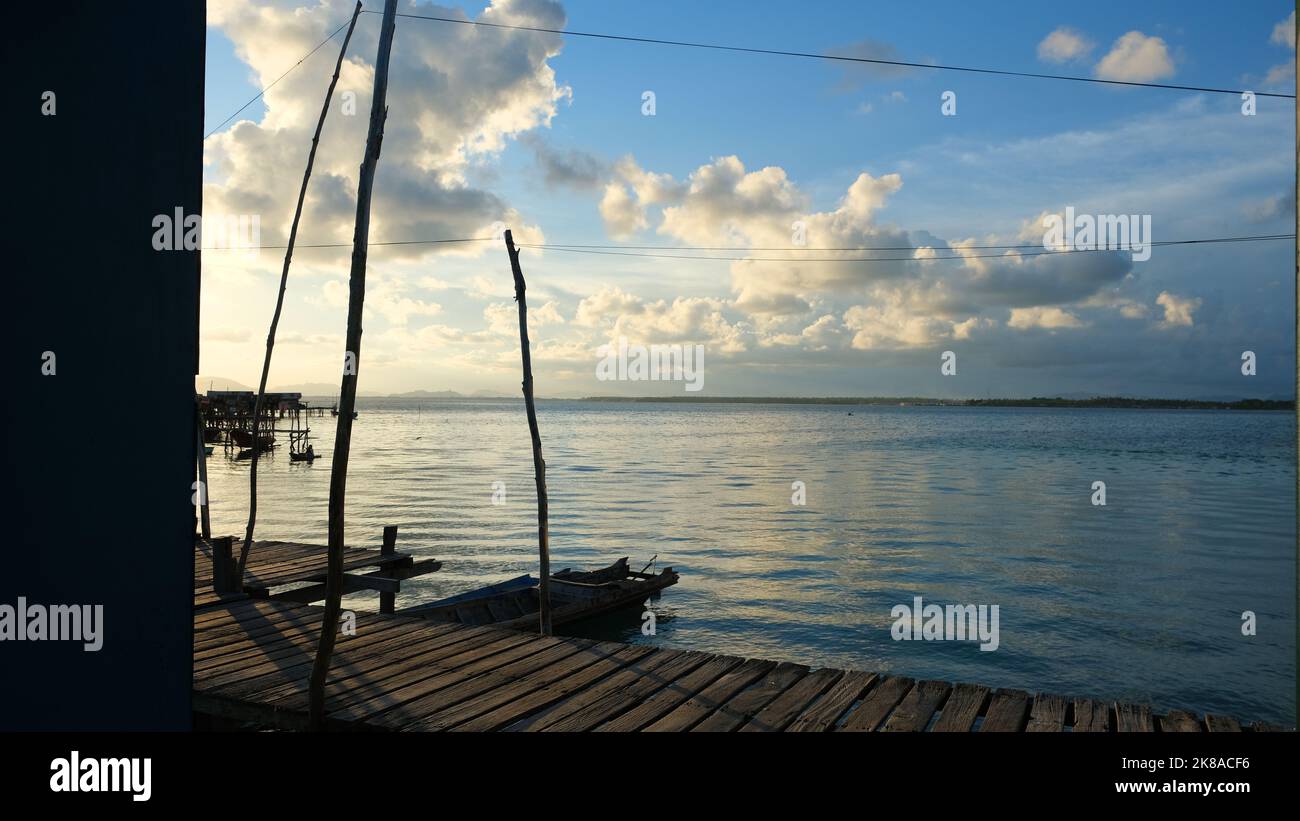 Beautiful sunset time at a bajau village, Pulau Omadal Stock Photo - Alamy