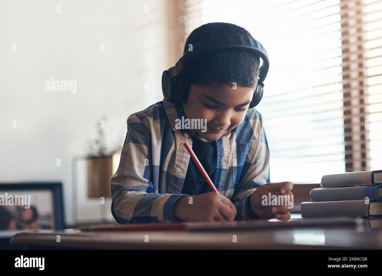 The more we play, the more we learn. an adorable little boy using a ...