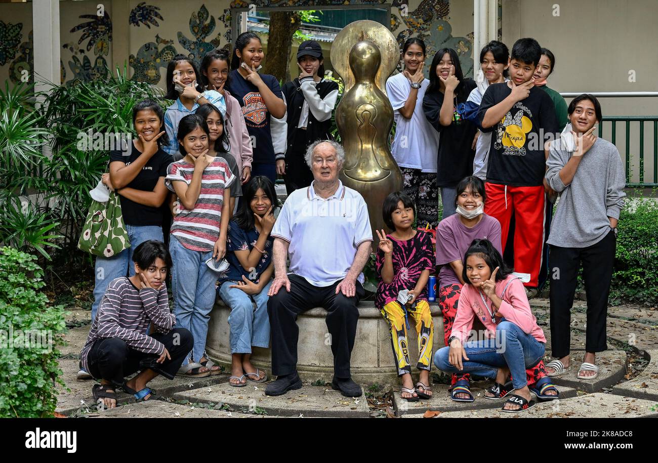 Father Joseph H. Maier, 82, of the USA poses for a group picture with ...