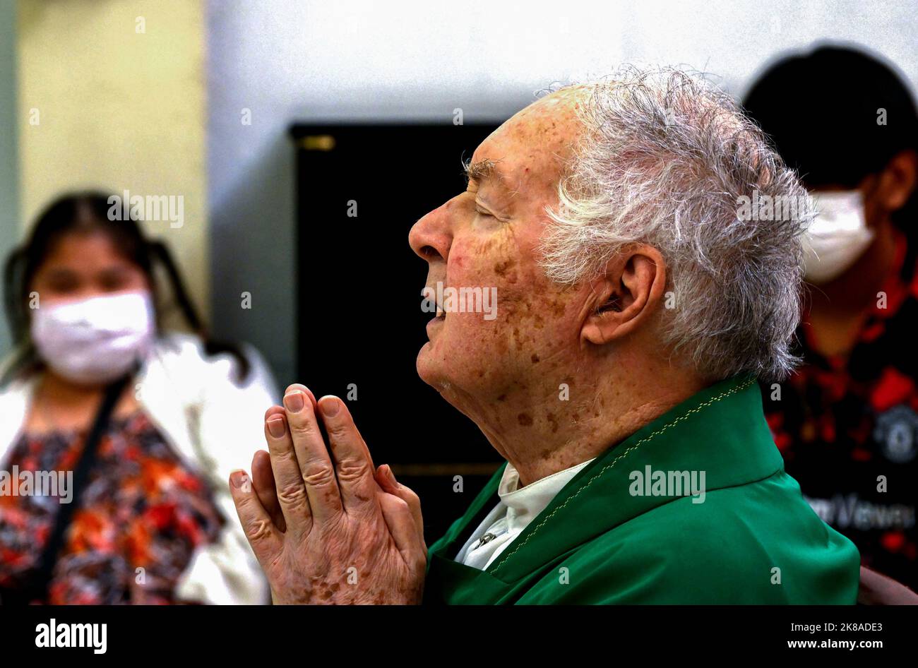 Father Joseph H. Maier, 82, of the USA is seen praying during a ...