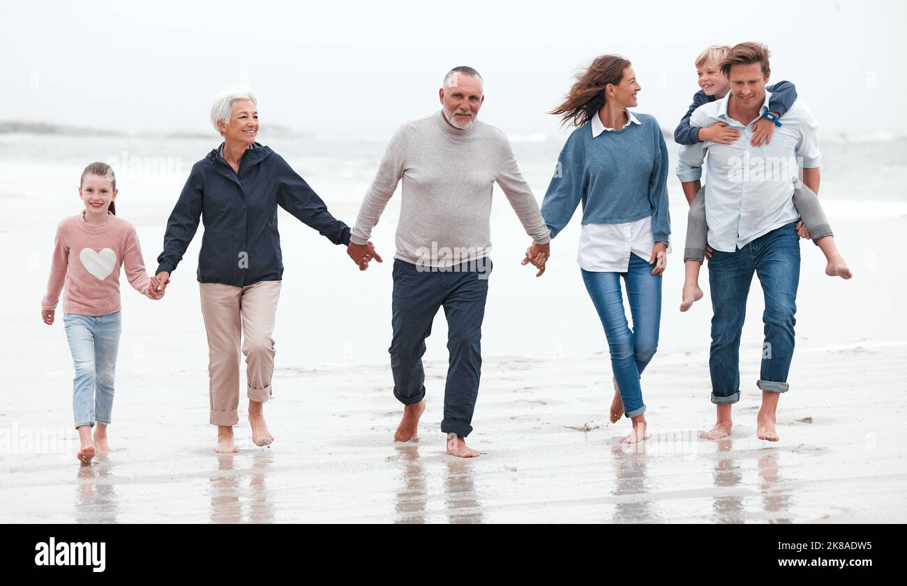 Beach, walking and big family on exercise while on vacation in ...