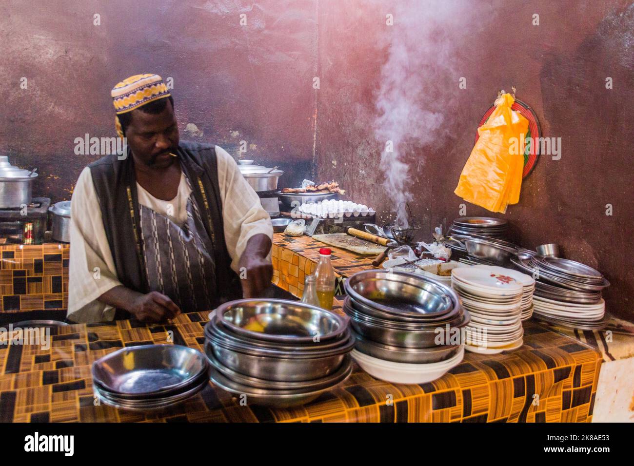 ABRI, SUDAN - FEBRUARY 26, 2019: Cook in a small restaurant in Abri ...
